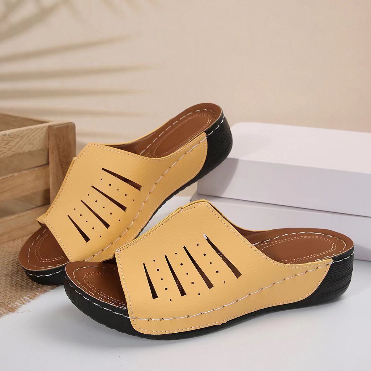Hollow slope heel slippers