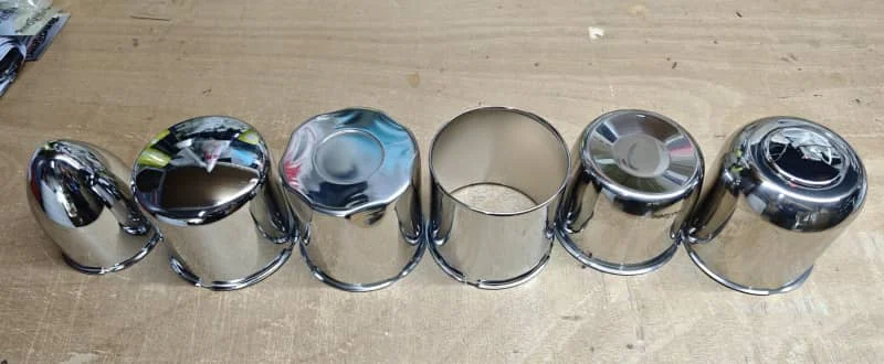Why Are Some Trailer Push Through Center Caps Closed, Some are Open?