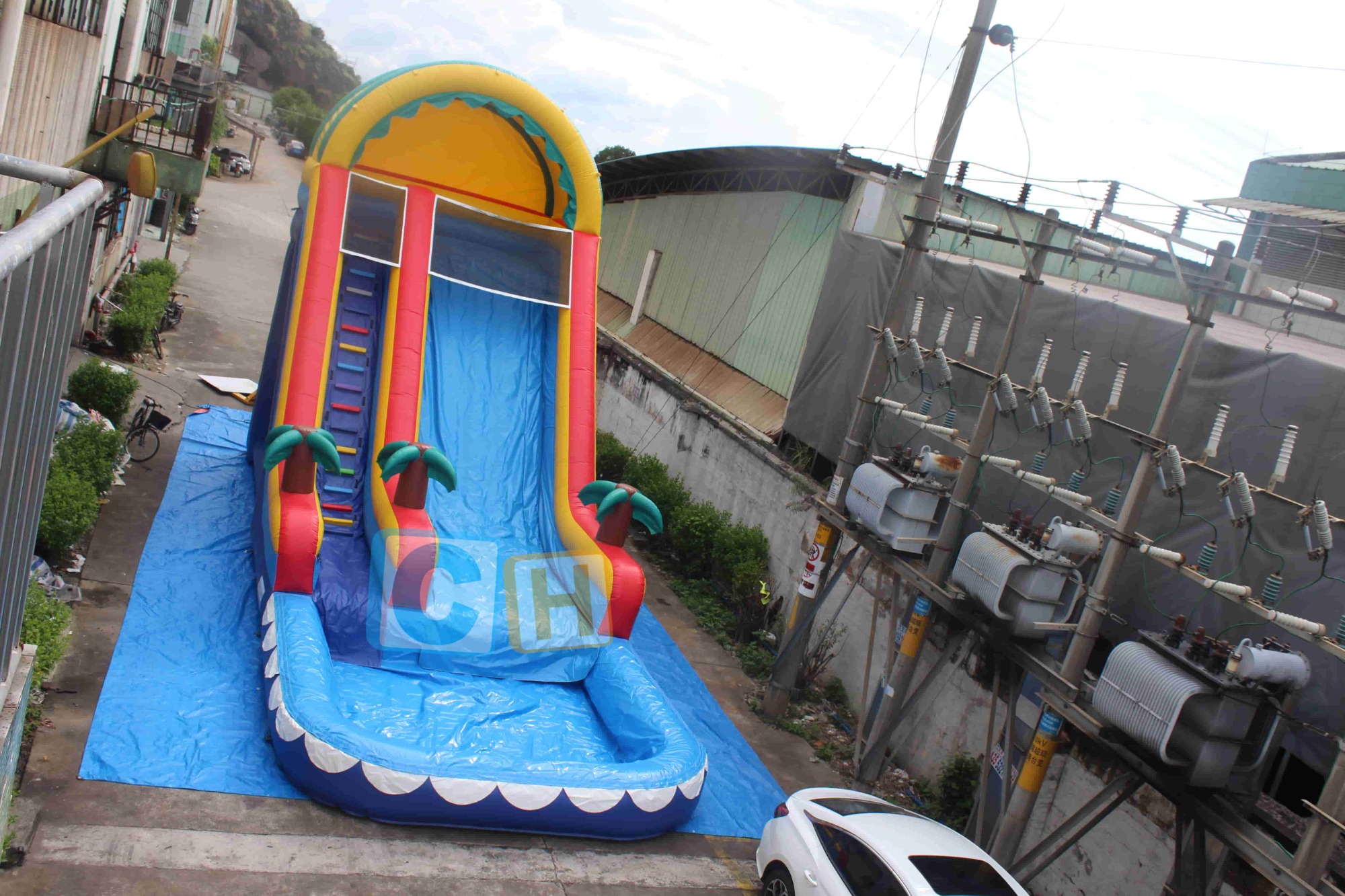 Inflatable bounce house and water slide