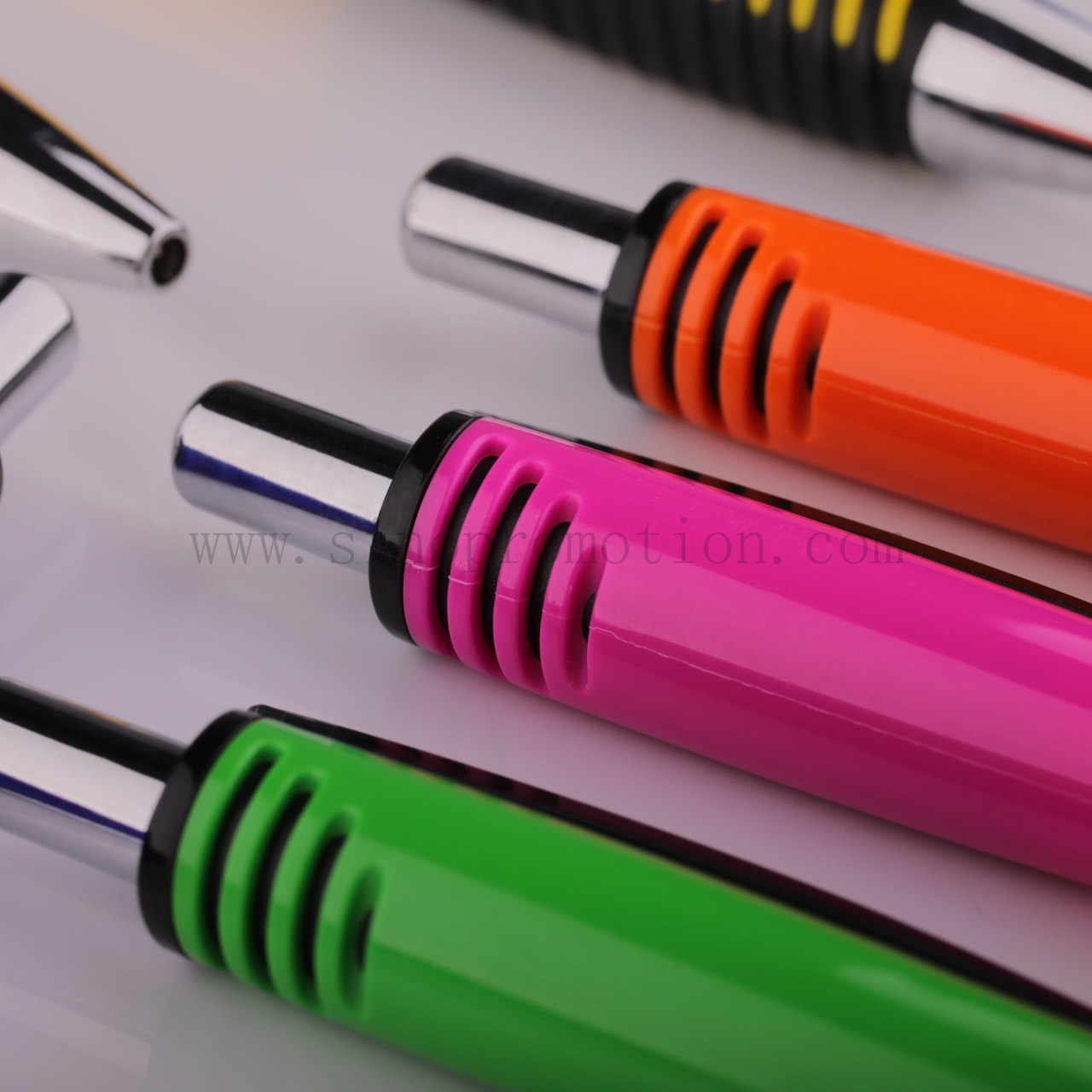 Simple plastic ball pen with colorful barrel and black grip by ...