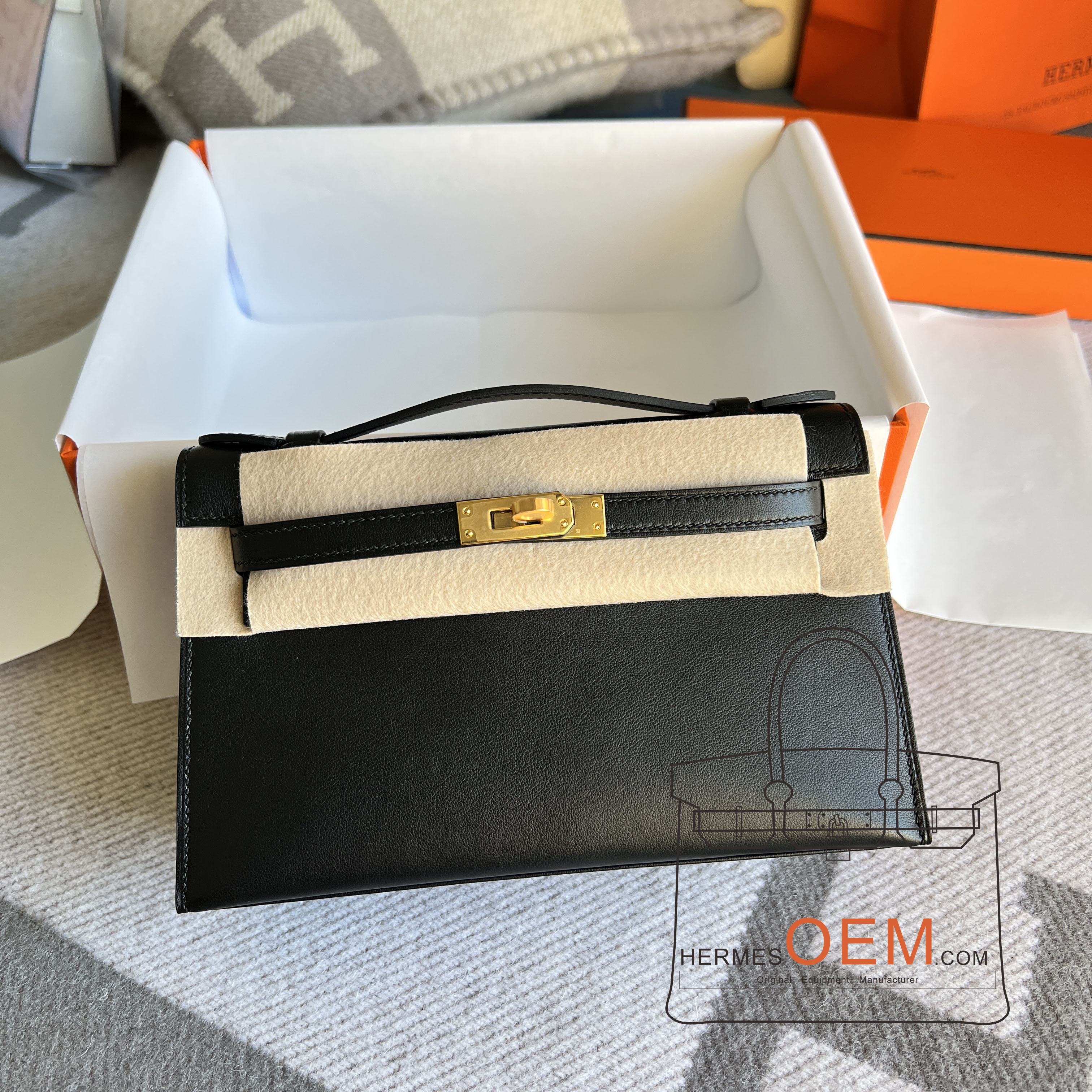 Kelly pochette Swift Noir Gold