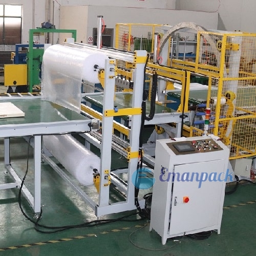 Horizontal orbital wrapping machine with film dispenser packing ...