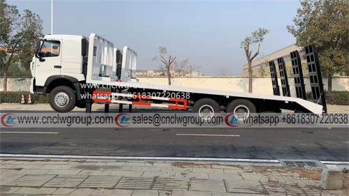 Sinotruk HOWO 10W 25 ton flatbed truck winch self loader howo self ...