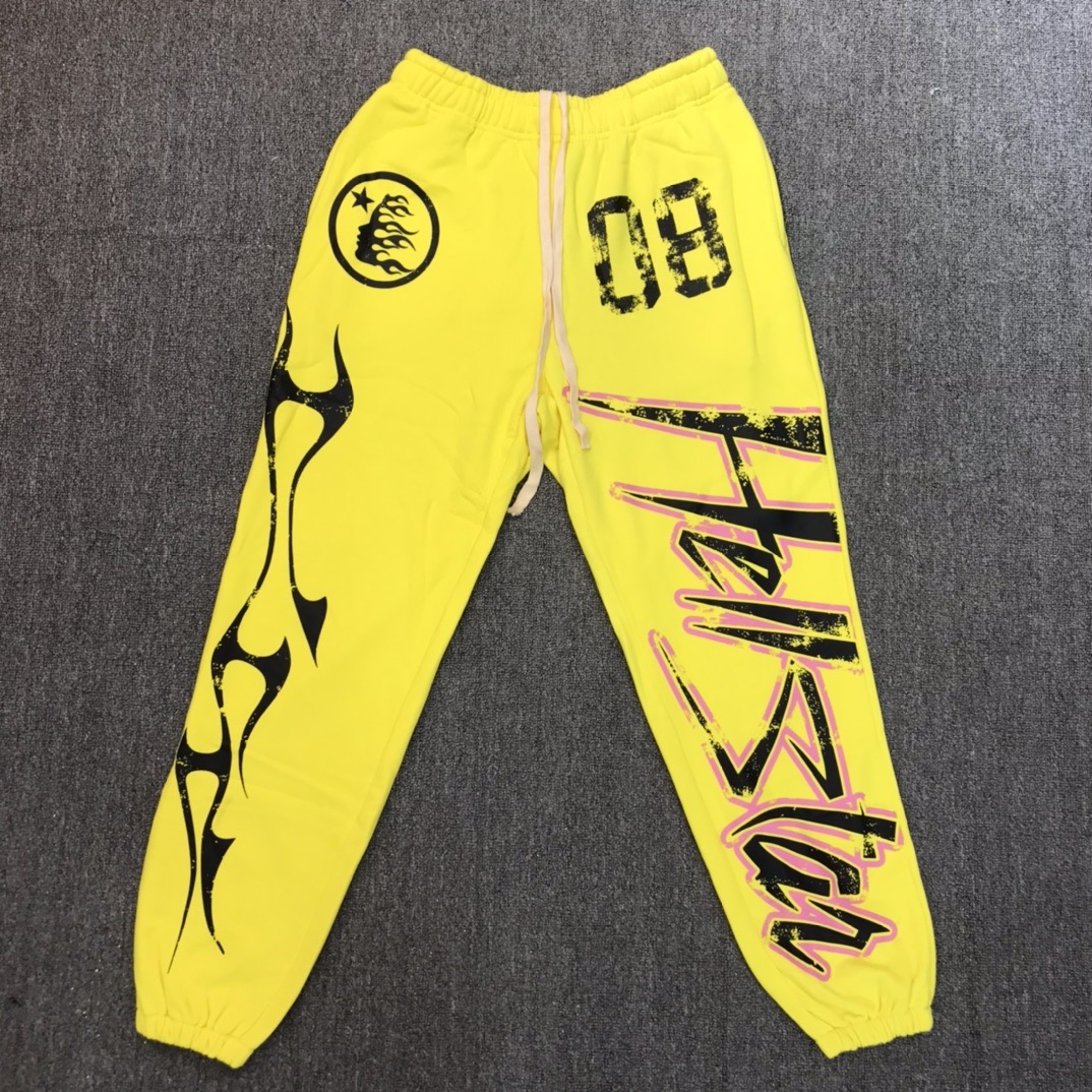 Hellstar studios letters sweat pants yellow black green