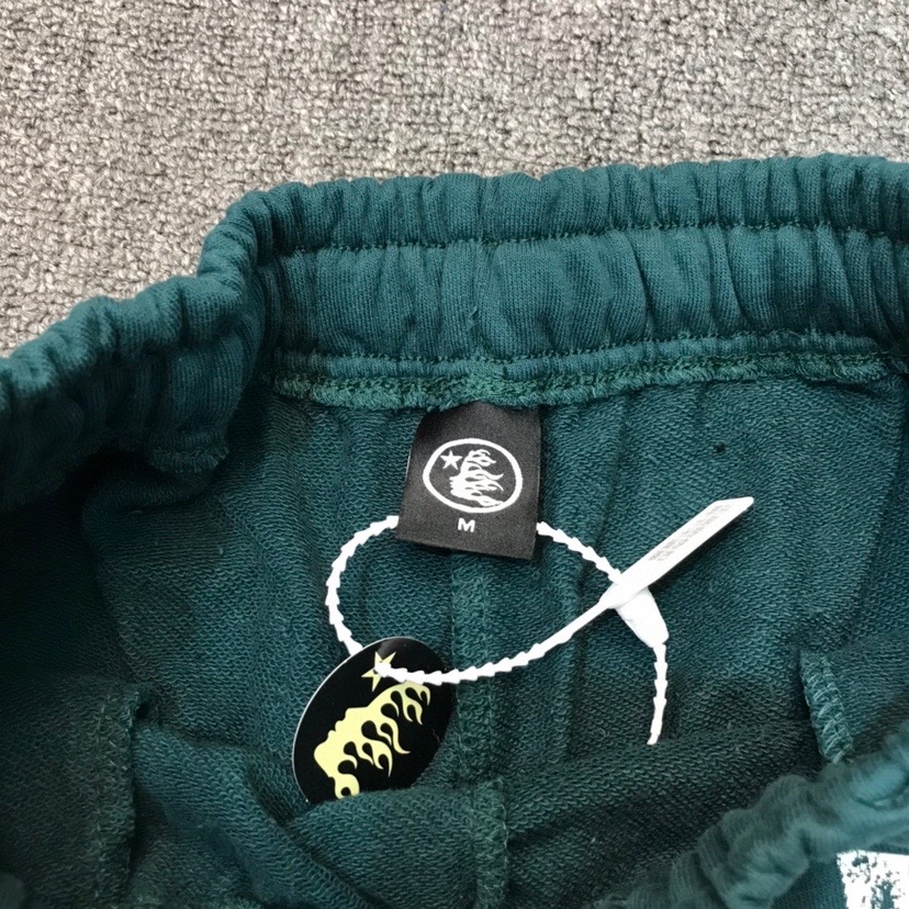 Hellstar studios letters sweat pants yellow black green