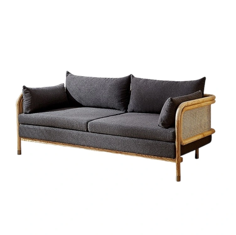 Rattan three seater sofa