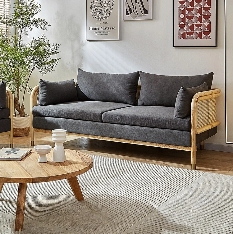 Rattan three seater sofa