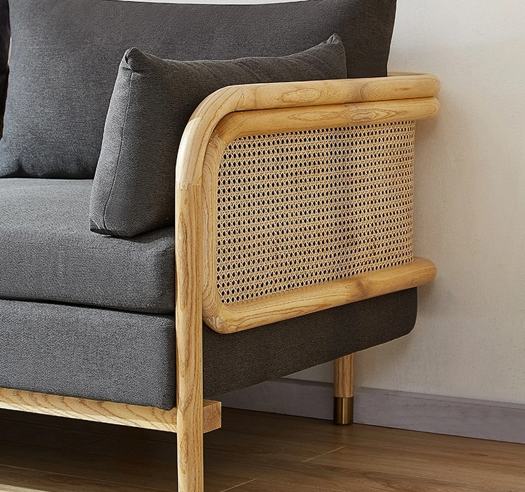 Rattan three seater sofa