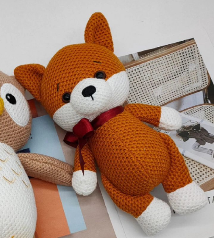 Knitted fox plush toy