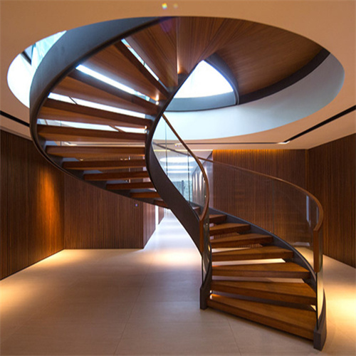 Customized curved oak wood tread stairs with wood handrail for villa