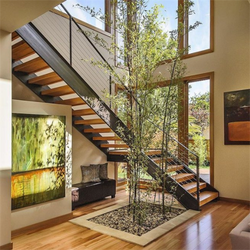 Villa L shape staircase steel stringer stairs cable railing stairs