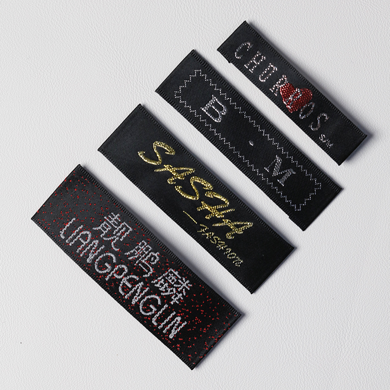 Custom Black Satin Woven Labels | Sleek Branding Solutions