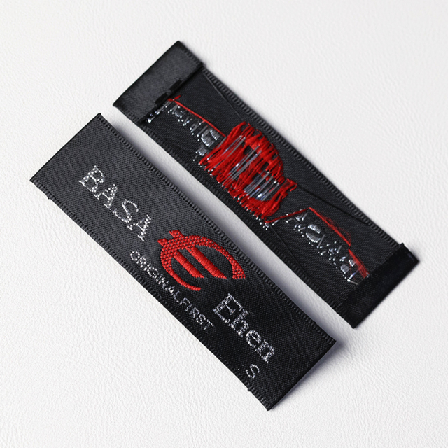 Custom Black Satin Woven Labels | Sleek Branding Solutions