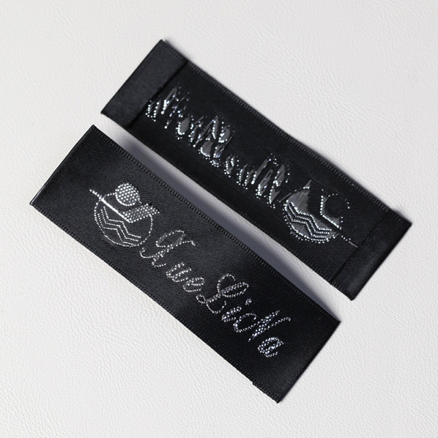 Custom Black Satin Woven Labels | Sleek Branding Solutions