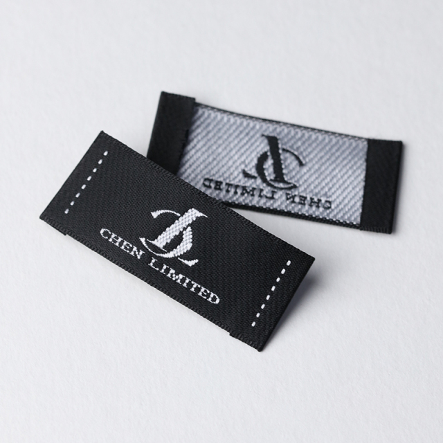 Custom Black Satin Edging Woven Labels | Precision Craftsmanship