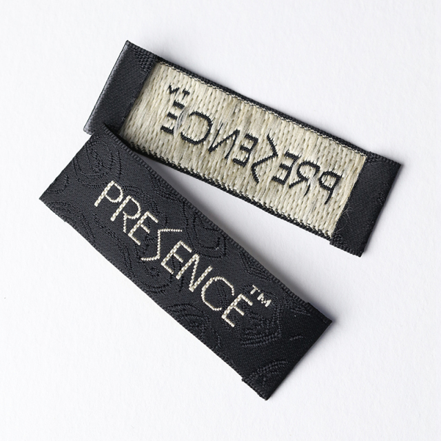 Custom Black Satin Edging Woven Labels | Precision Craftsmanship