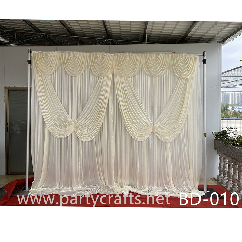 white fabric wedding stage backdrop