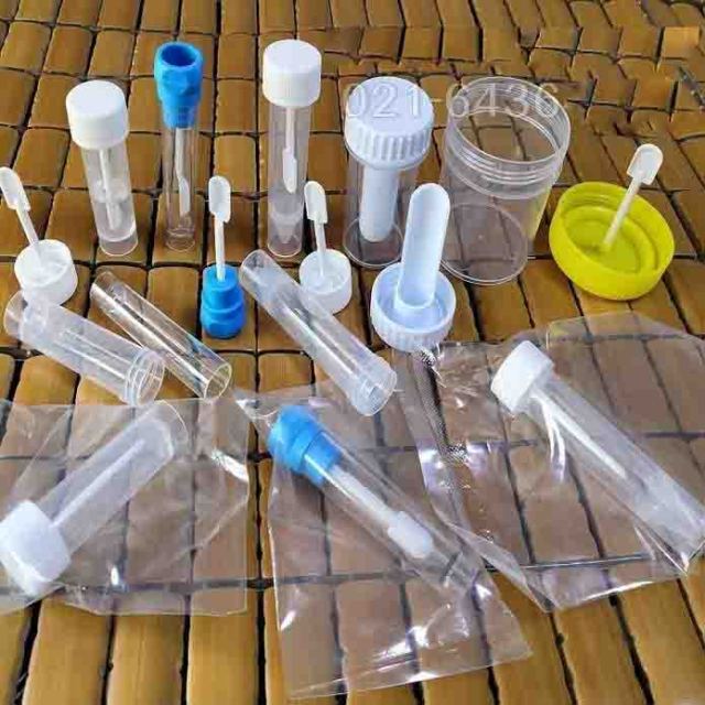 Fecal collection and preservation tube