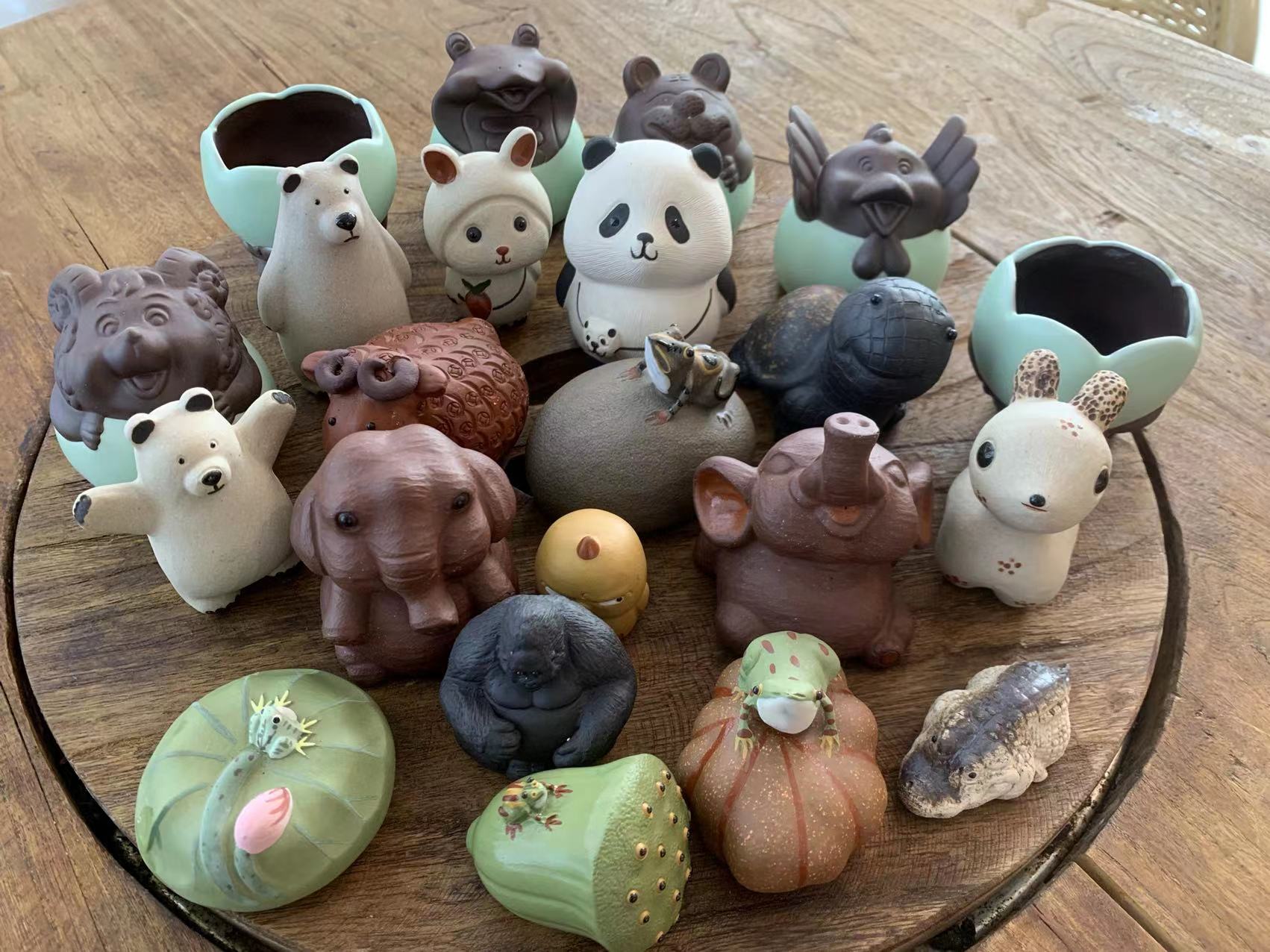 Purple clay tea pet