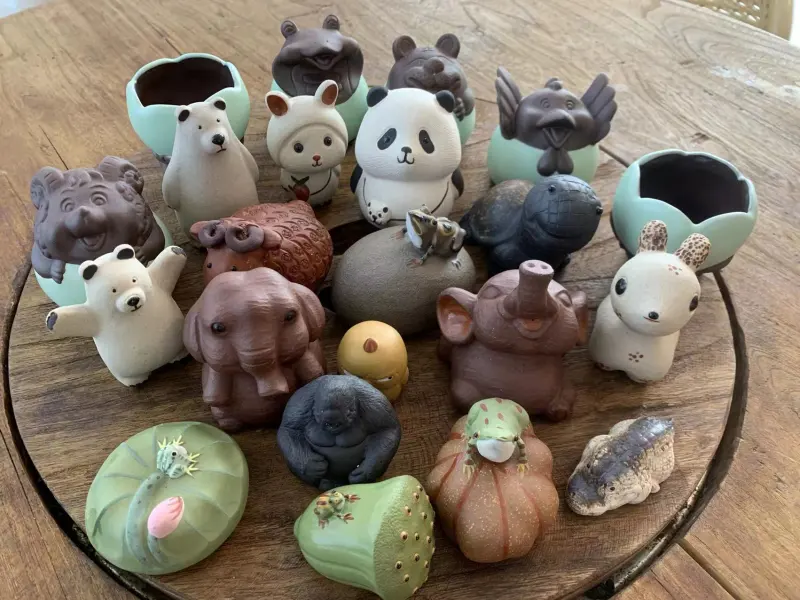 Purple clay tea pet
