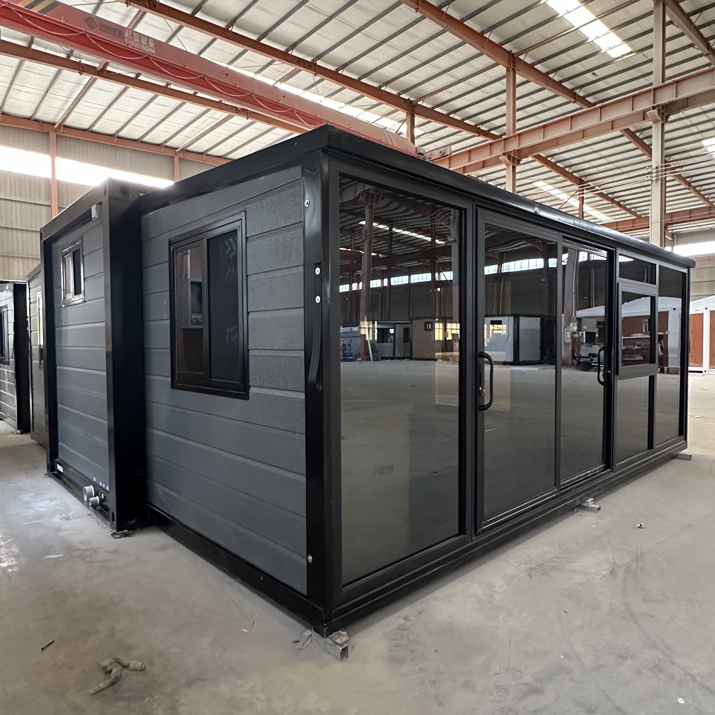 Container House with One Side Glass