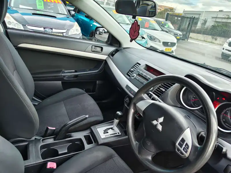 2008 MITSUBISHI LANCER ES, auto, $ 2999 Cheap runaround.