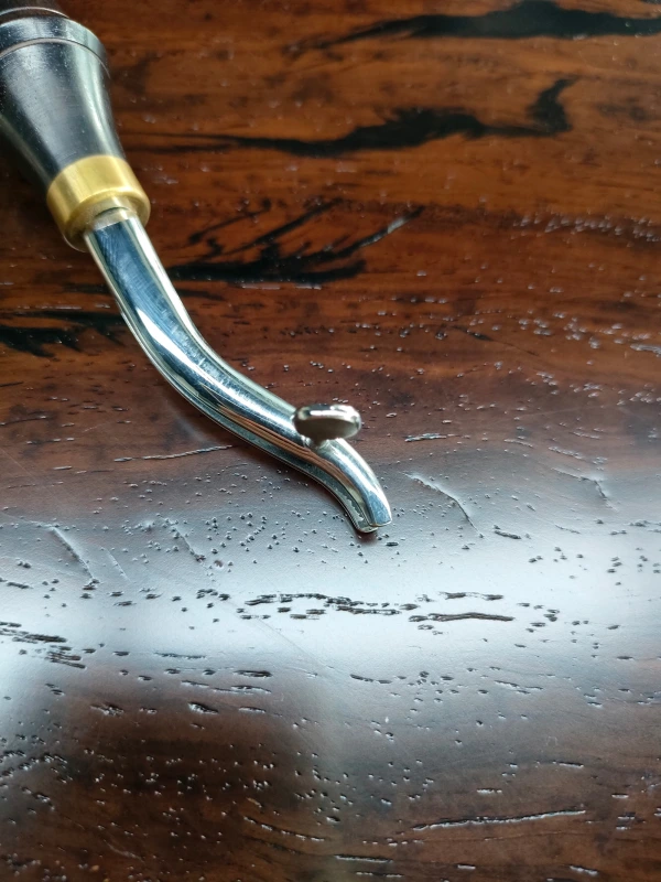 Adjustable creaser