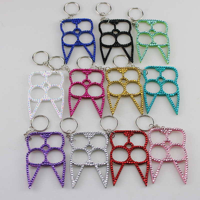 Wholesale bling cat knuckle keychain.