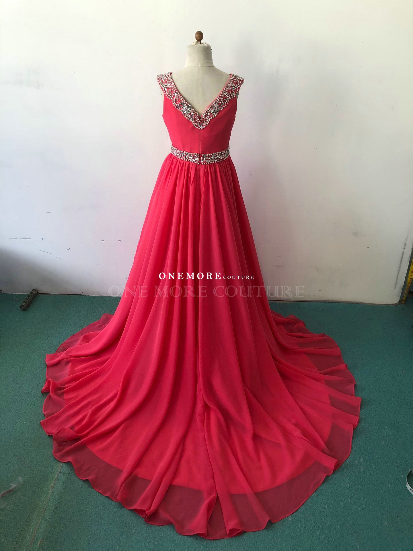 Coral Pink V-Neck Pageant Gown with Crystal Embellishments